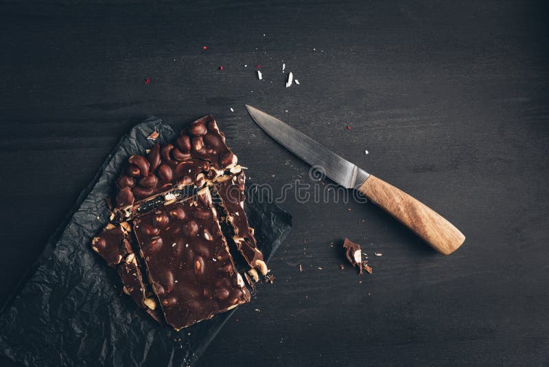 Cut Chocolate Bar and Knife Stock Photo - Image of hazelnuts, sweet ...