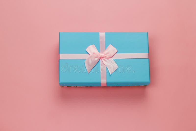 Cute Blue Present Box on a Pastel Pink Background Stock Image - Image ...