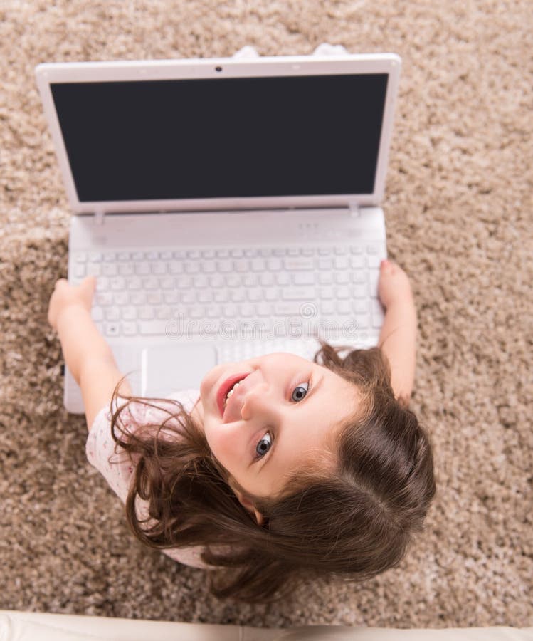 Top View of Cute Girl Holding Computer. Stock Image - Image of ground ...