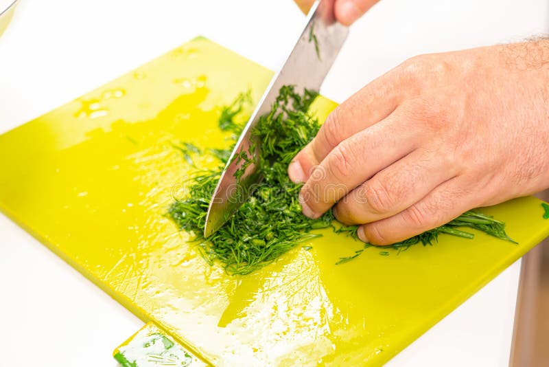 Top View Cutting Dill for Making Salad with Kitchen Knife Stock Photo ...