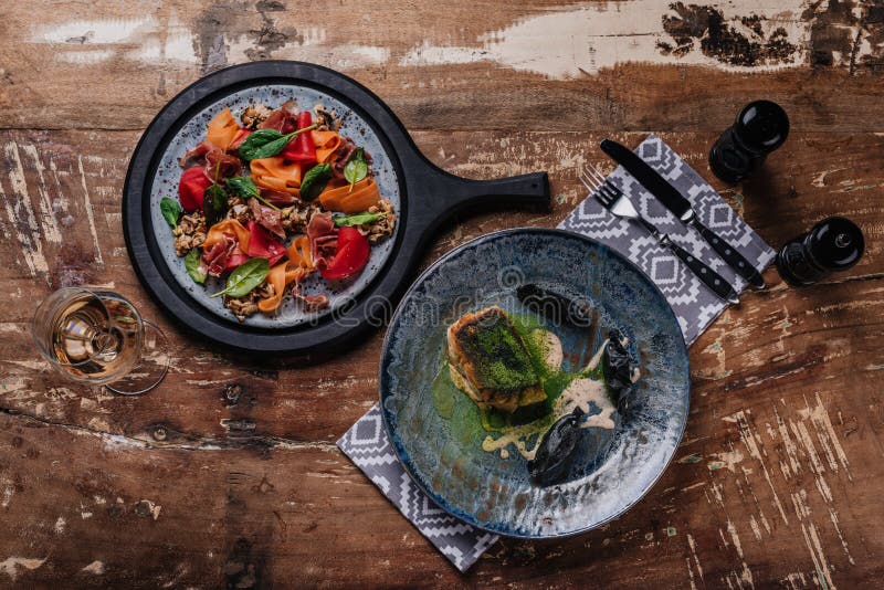 Top View of Delicious Dishes on Plates Stock Image - Image of food ...