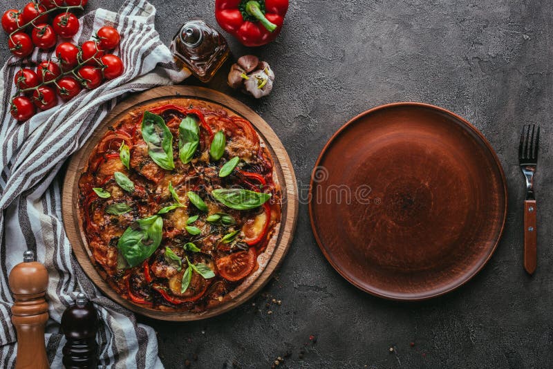 Top View of Delicious Pizza with Rustic Plate Stock Image - Image of ...