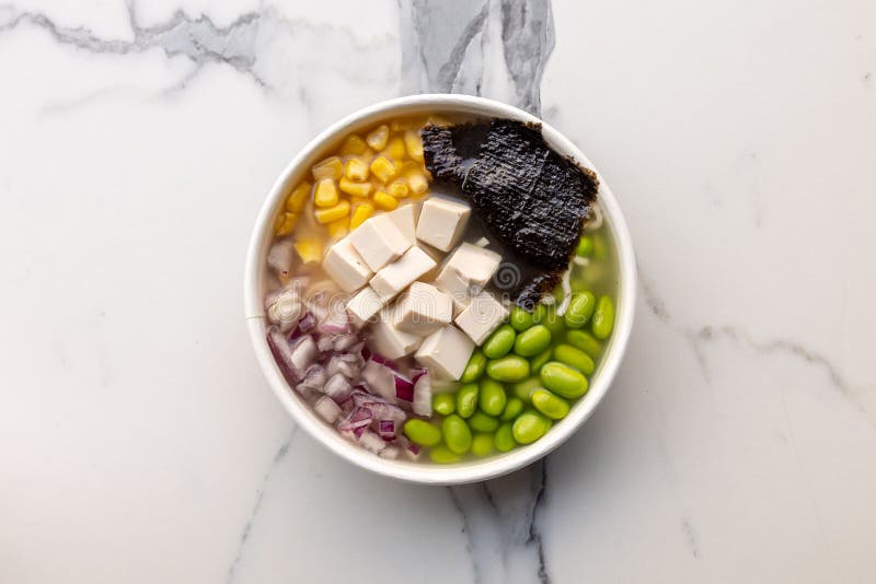 Top View of a Delicious Poke Bowl with Beans and Corn Served on the ...