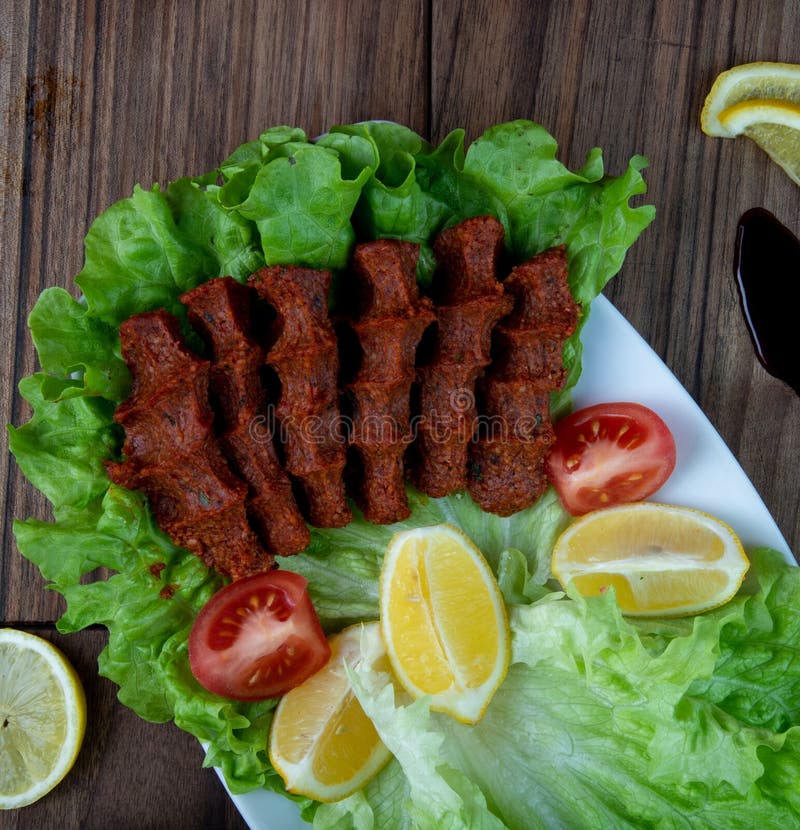 Top View of a Delicious Turkish Chee Kofta Dish with Lettuce, Tomato ...