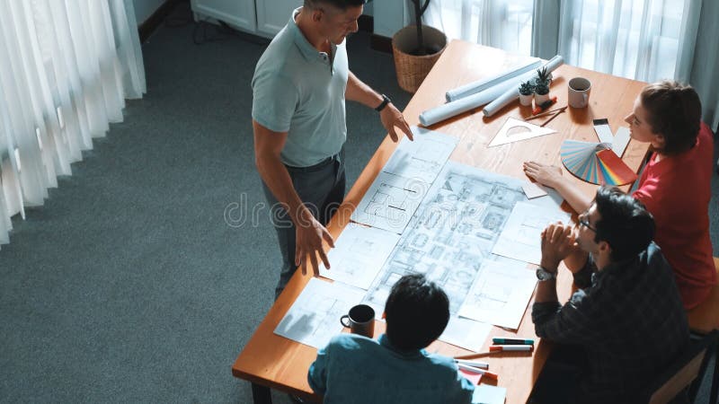 Top View of Designer Planning Building while Manager Hold Coffee ...