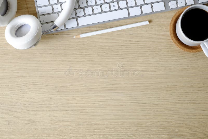 Top View Desk Work Office Table with Computer, Headphones, Coffee and ...