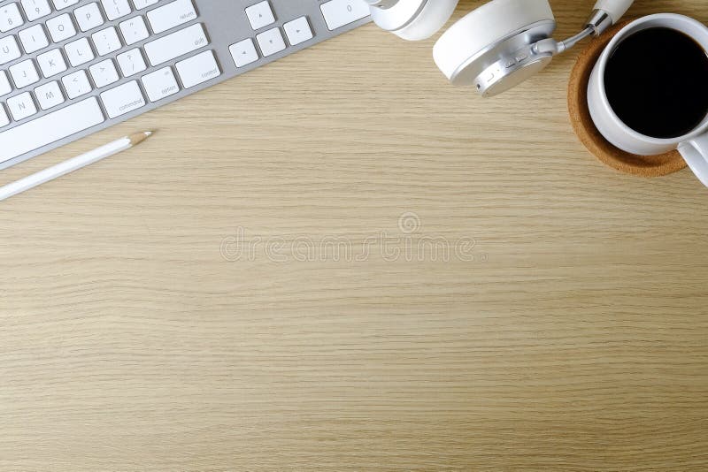 Top View Desk Work Office Table with Computer, Headphones, Coffee and ...