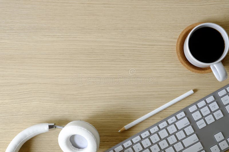 Top View Desk Work Office Table with Computer, Headphones, Coffee and ...