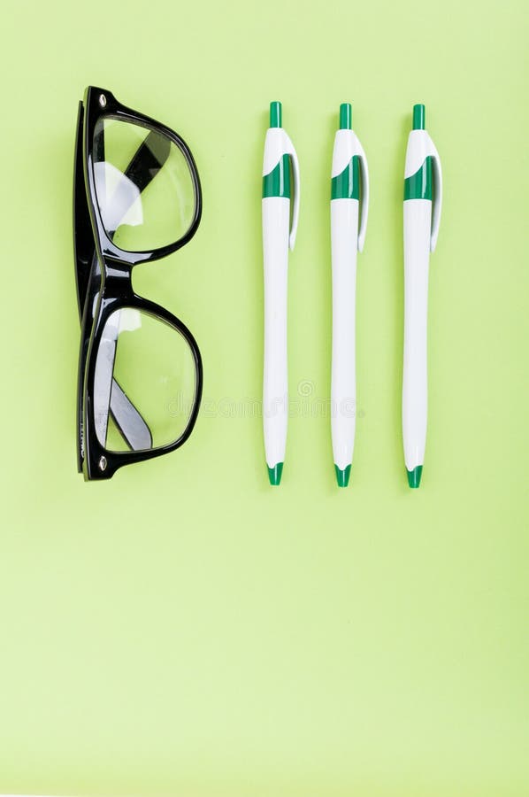 Top View of Desktop with Spectacles and Pens Stock Image - Image of ...