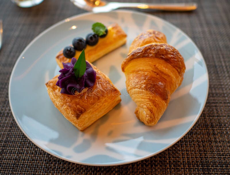 Top View of a Dessert Dinner Table with a Croissant and Other Pastries ...