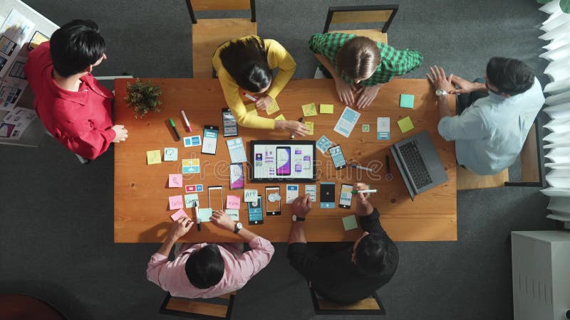 Top View of Developer Team Working Together To Write Idea on Note ...