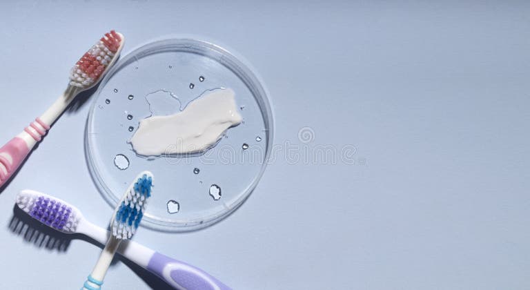 Top View of Different Colors Toothbrushes,sample of Toothpaste on the ...
