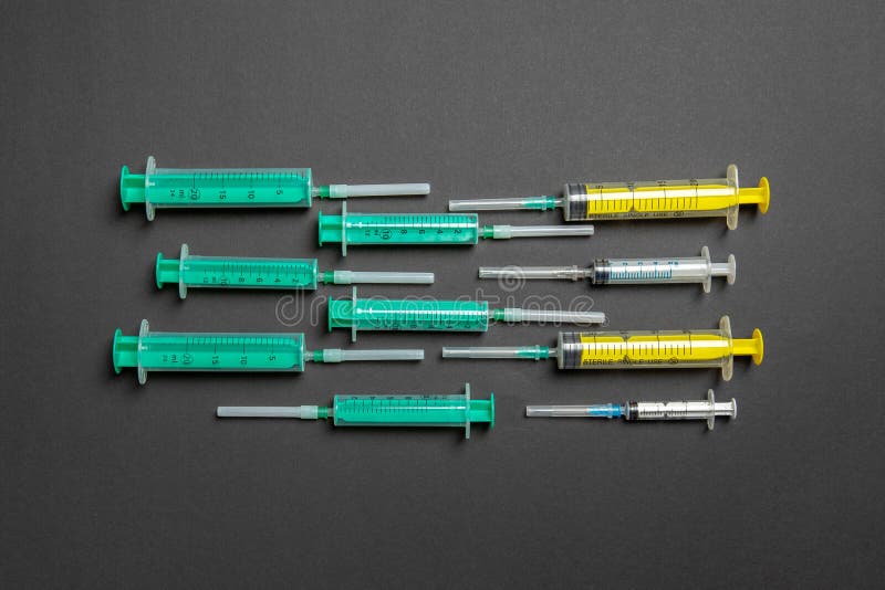 Top View of Different Syringes at Black Background. Medical Injection ...