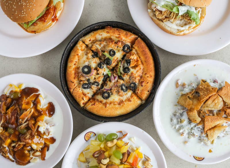 Top View of Different Types of Food in Bowls on Table Stock Photo ...