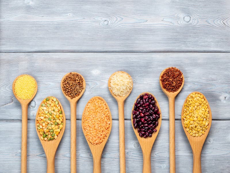 Top View of Different Types of Grains and Cereals in Wooden Spoons on a ...