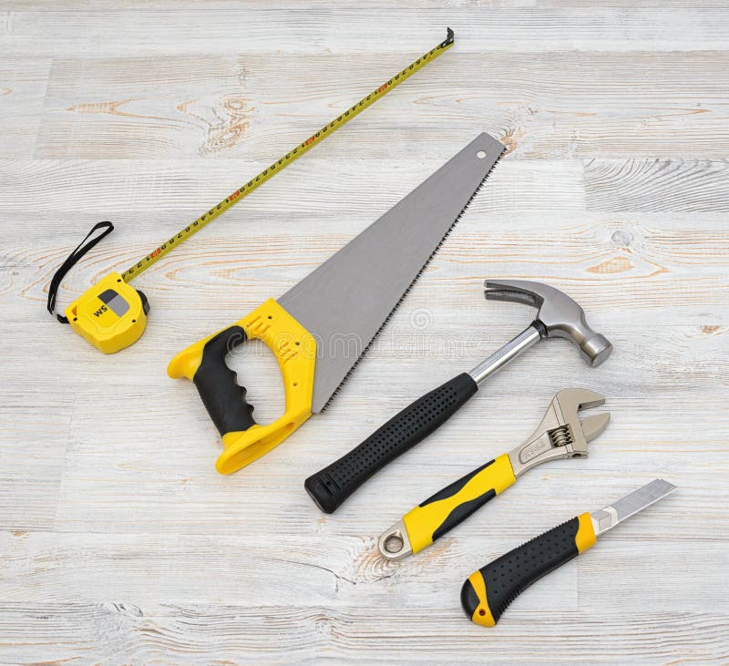 The Top View of Different Working Tools Lying on Wooden Workbench Stock ...