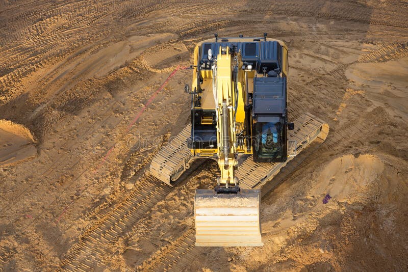 Yellow_digger stock image. Image of dredger, soil, building - 123365685