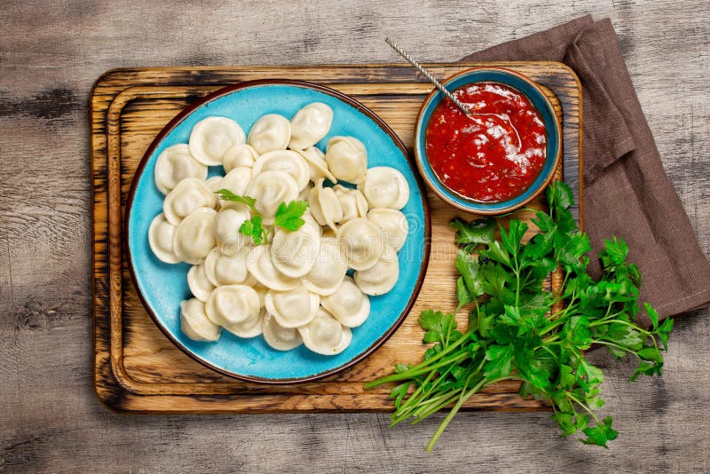 Top View Dish with Ravioli and Red Sauce Stock Image - Image of board ...