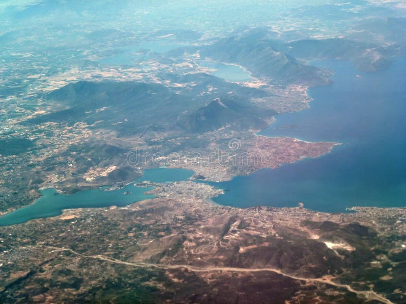 Top View of Distant Sea Bay and Mountains. View from the Plane Stock ...