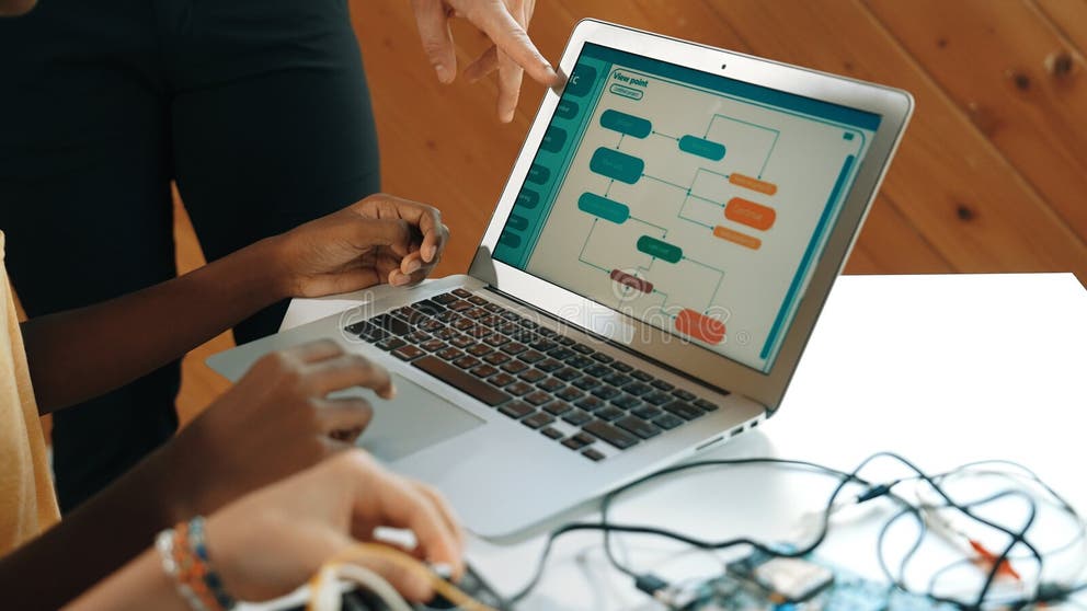 Top View of Diverse Smart Children Working Together Coding Program ...