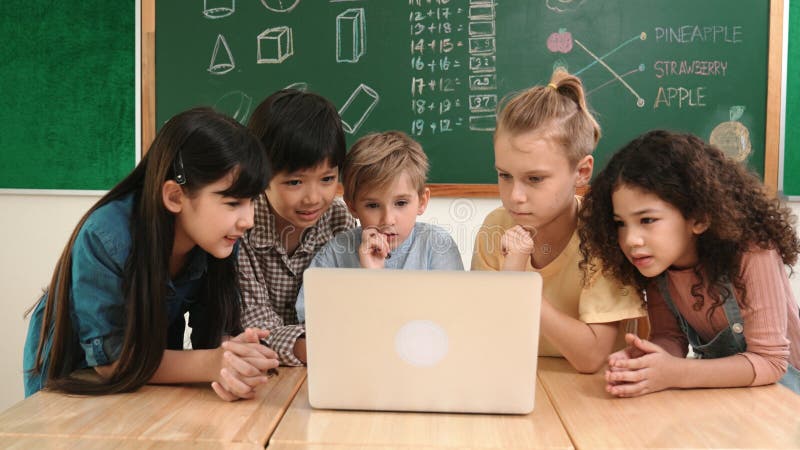 Top View Diverse Student Looking at Laptop and Learning about Code ...