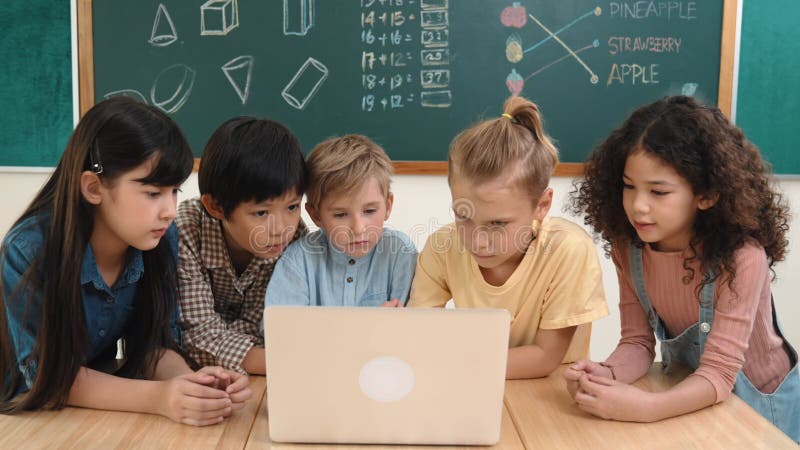 Top View Diverse Student Looking at Laptop and Learning about Code ...