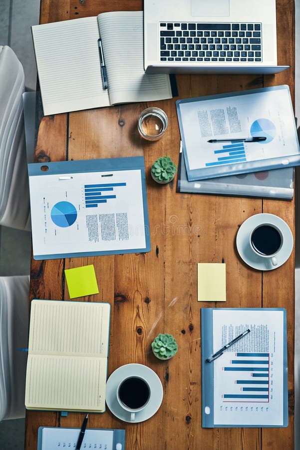 Top View, Documents and Charts on Table for Finance Meeting, Annual ... Top View, Documents and Charts on Table for Finance Meeting, Annual ...