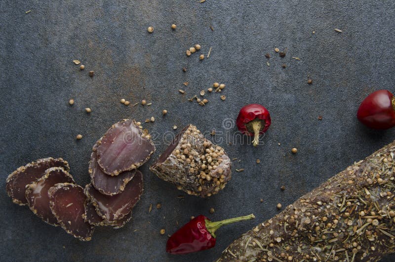 Top View of Dried Meat with Red Pepper on Dark Table Stock Photo ...