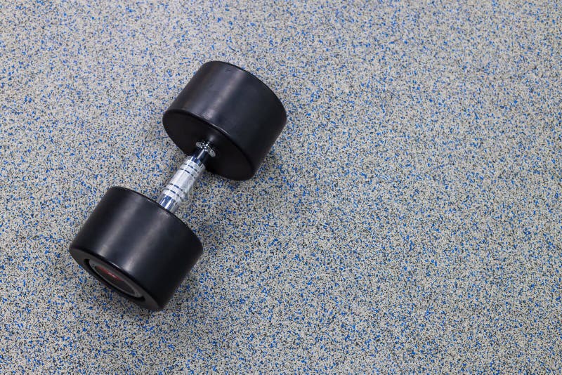Top View of a Dumbbell Lying on the Floor. Equipment for Strength ...