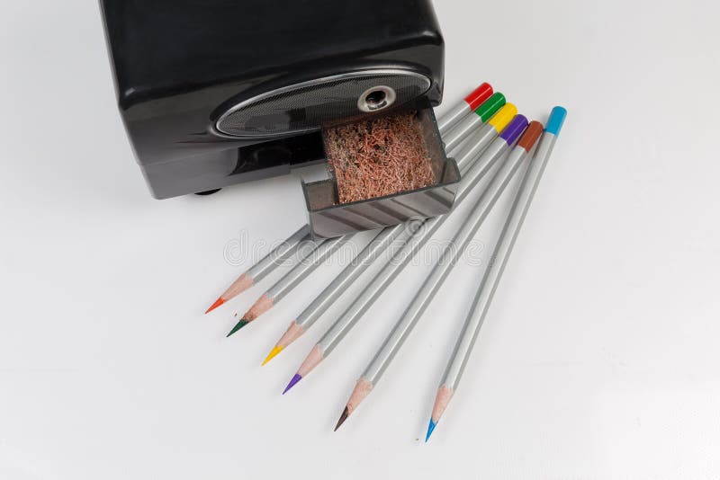 Top View of Electric Pencil Sharpener and Colored Pencils Stock Photo ...