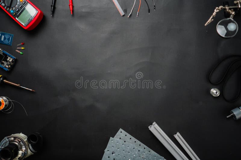 Top View of Electronic and Engineering Tools on a Black Workbench Stock ...