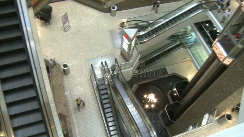 Top View of Elevators and Escalators Moving within Mall (2 of 2) Stock ...