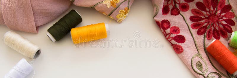 Top View of Embroidered Cloth and Colorful Threads on White Background ...