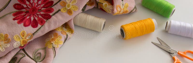 Top View of Embroidered Cloth and Colorful Threads on White Background ...