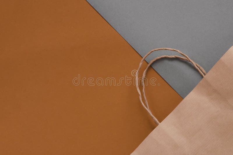 Top View of Empty Craft Paper Bag on a Maroon Background. Flat Lay on ...