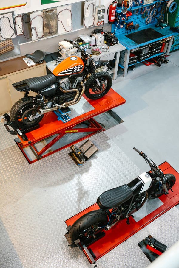 Top View of Empty Motorcycle Workshop with Custom Motorbikes Over ...