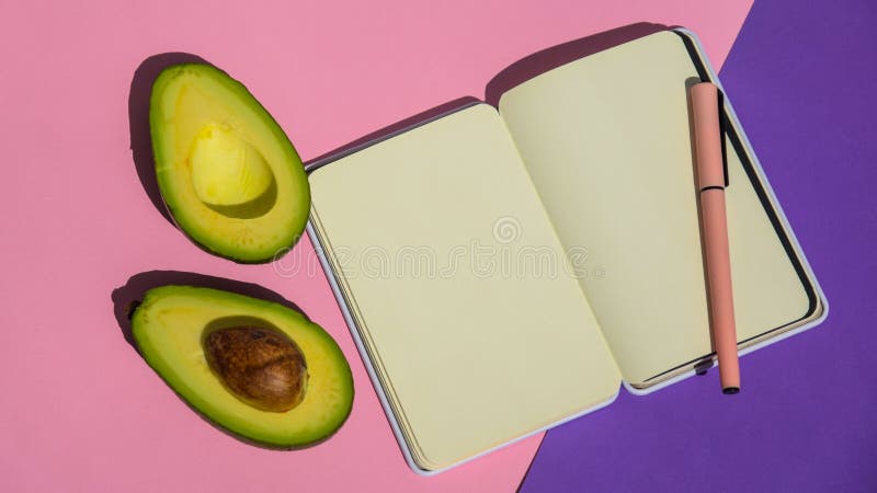 Top View. Top View an Empty Notepad and Sliced Avocado on a Pink ...