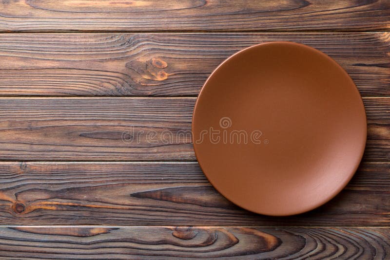 Top View of Empty Plate on Wooden Background. Empty Space for Your ...