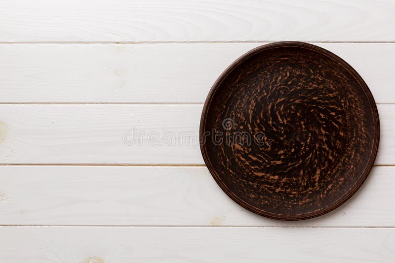 Top View of Empty Plate on Wooden Background. Empty Space for Your ...