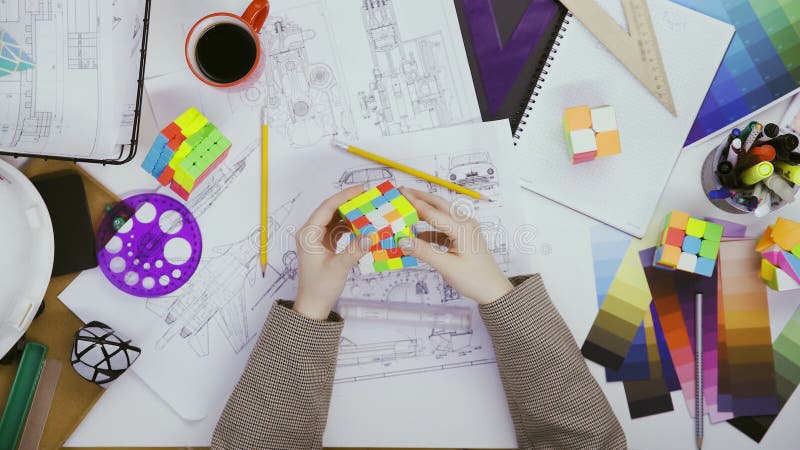 Top View Engineer Working on a Car Design Sketch and Playing with 4x4 ...