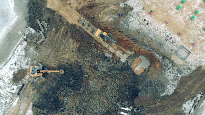 Top View of the Excavating Machines Digging and Transporting Soil Stock ...