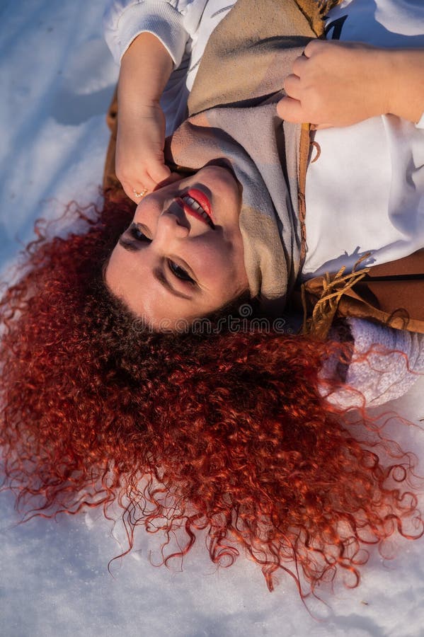 Top View of a Fat Red-haired Woman Lying on the Snow. Stock Image ...