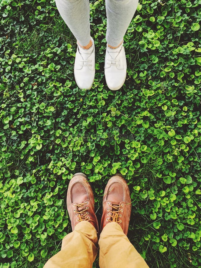 Top View of Feet of Young Couple on Grass Ground Stock Photo - Image of ...