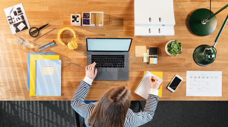 Top View of Female Student Working on Computer at Desk at Home. Stock ...