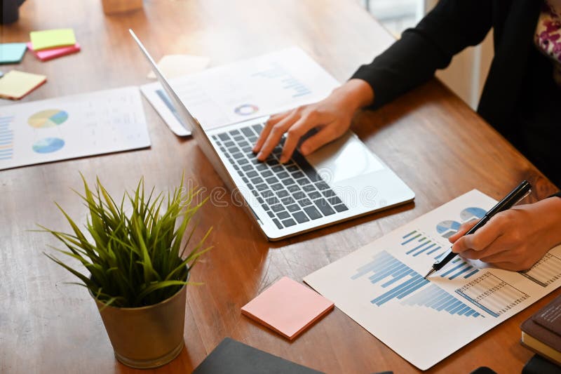 Top View Financial People Working with Paper Document Chart and Laptop ...