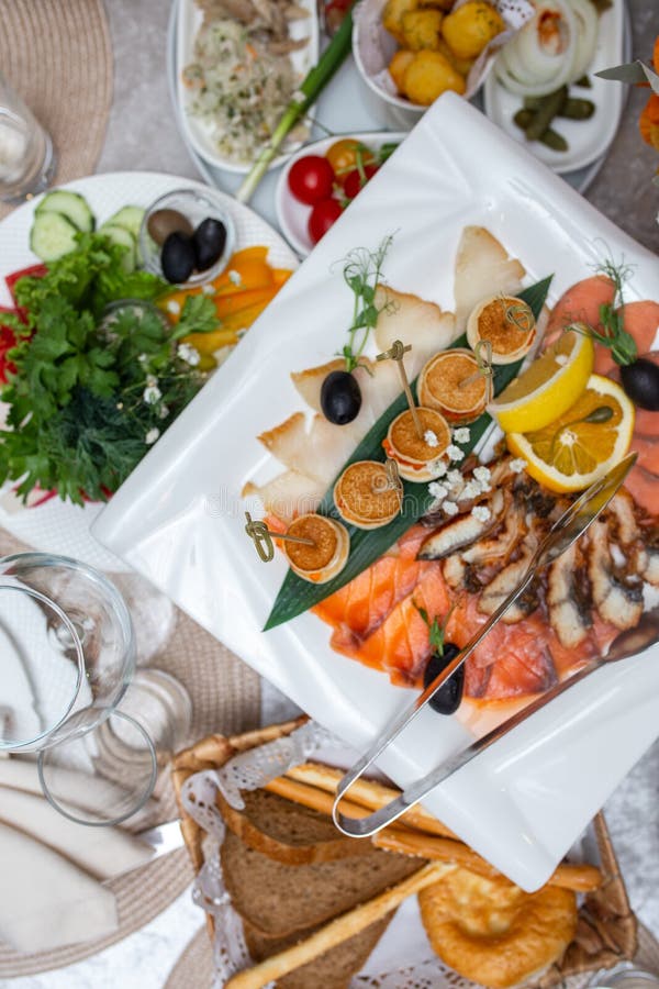 Top View of the Fish Cuts in the Assortment on a Festive White Plate ...