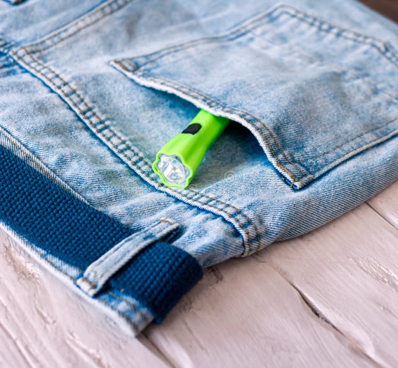 Top View Flashlight in Pants Pocket Stock Photo - Image of jean, army ...