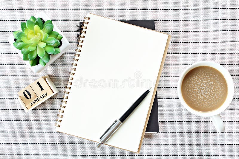 Top View or Flat Lay of Open Notebook Paper, Cube Calendar and Coffee ...