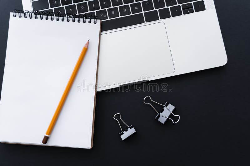 Top View of Fold Back Clips Stock Photo - Image of study, touchpad ...