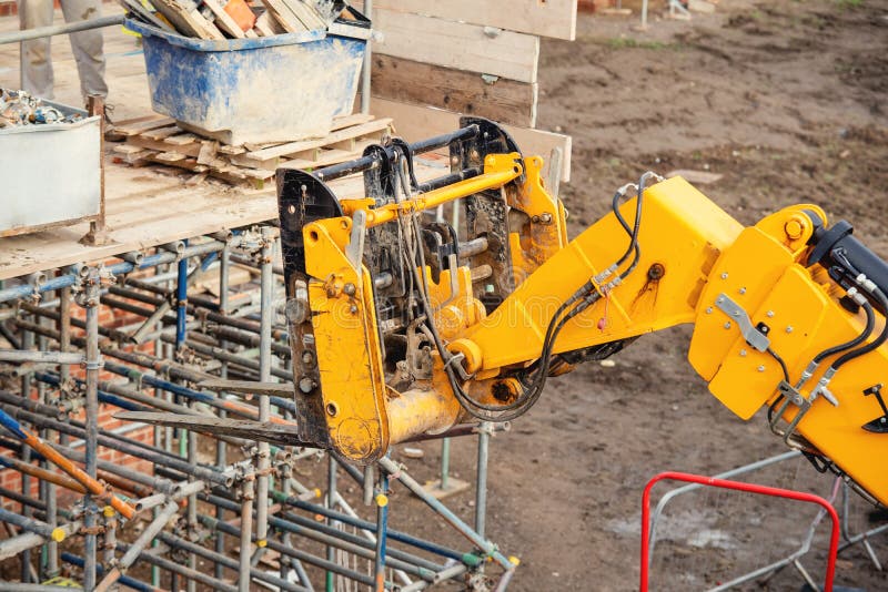Forklift Lifting Heavy Materials on Construction Site Stock Photo ...